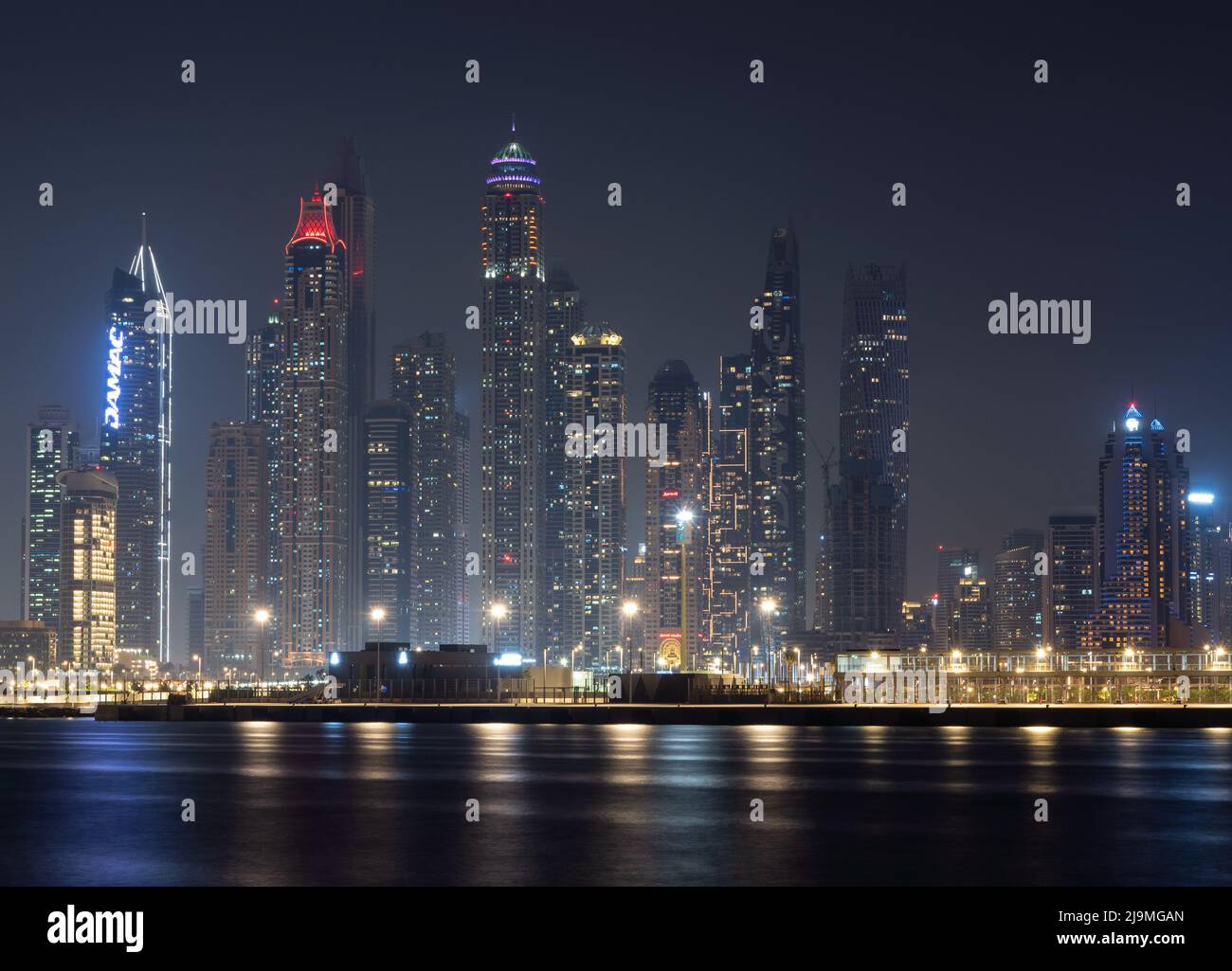 Dubai Marina night scene with city lights, luxury new high tech town in ...