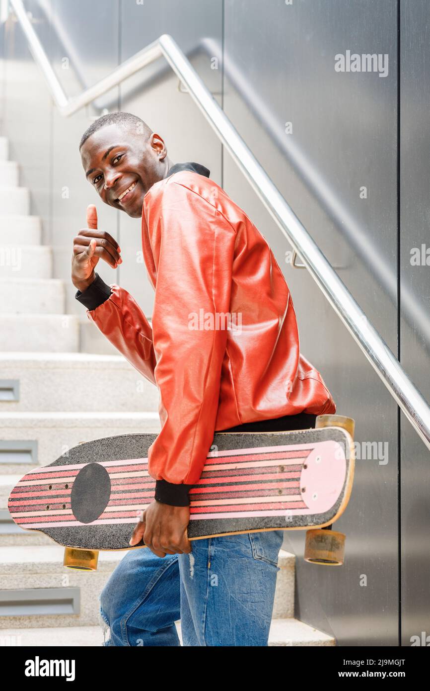 Smiling young man shaka hi-res stock photography and images - Alamy
