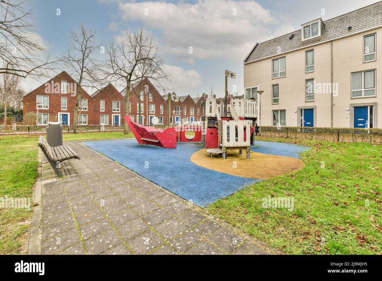 Facade of residential buildings with children colorful playground ...