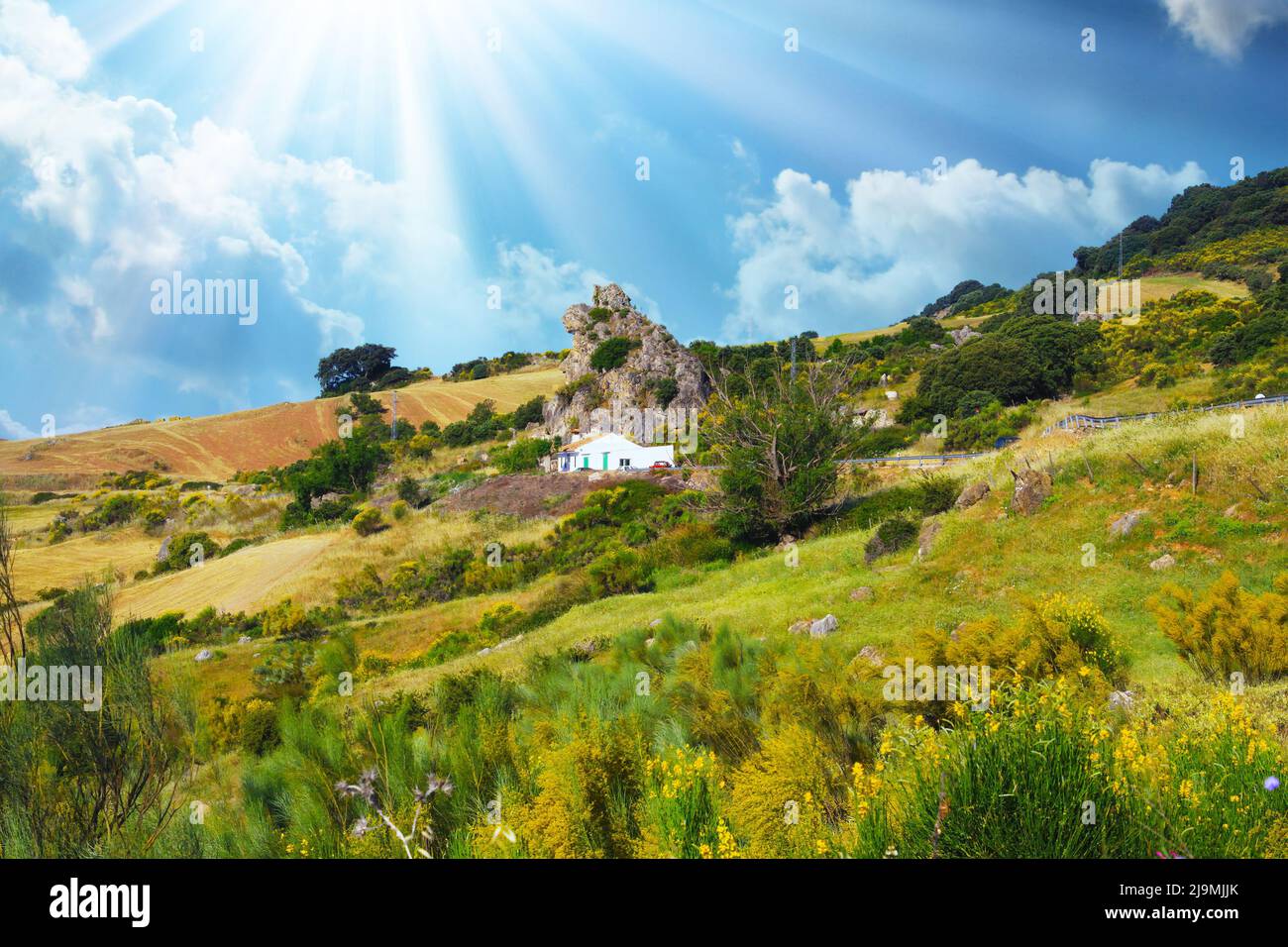 Typical andalusian calm mountain valley landscape, sun rays, low ...