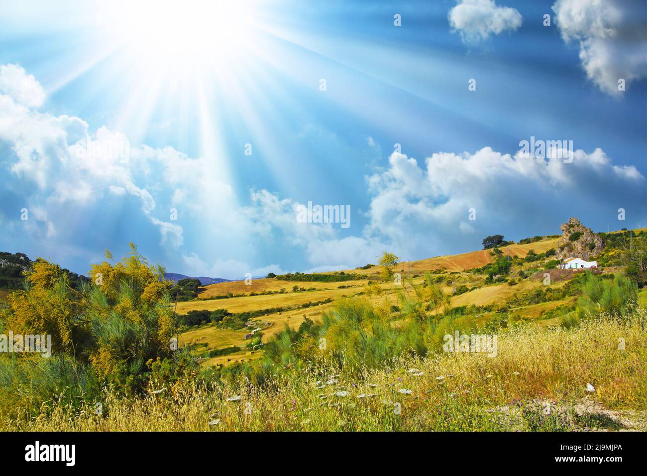 Typical andalusian calm mountain valley landscape, sun rays, low ...