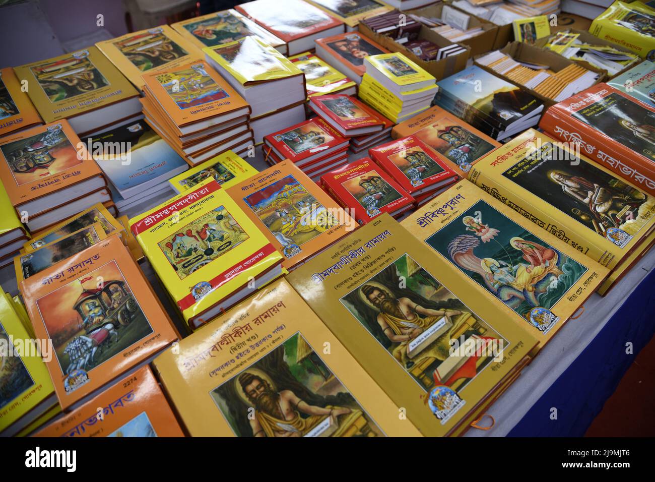 Hindu religious books inside the Gita Press pavilion at the 45th ...