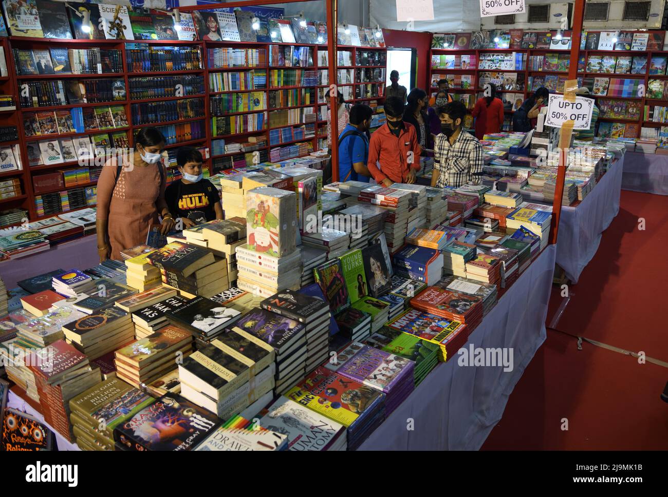 Visitors inside a book stall at the 45th International Kolkata Book ...