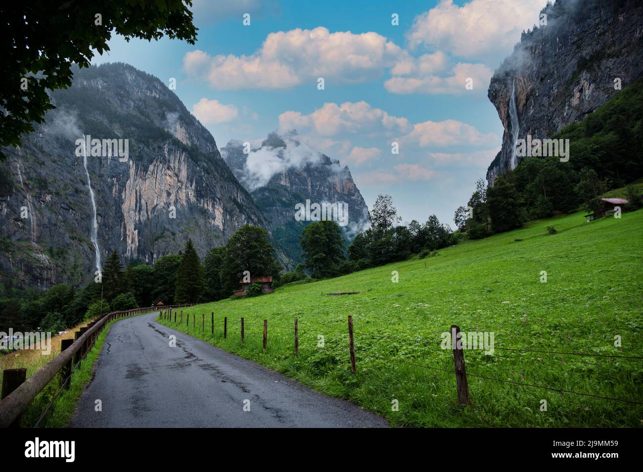 Picturesque landscape of touristic alpine village Lauterbrunnen with ...