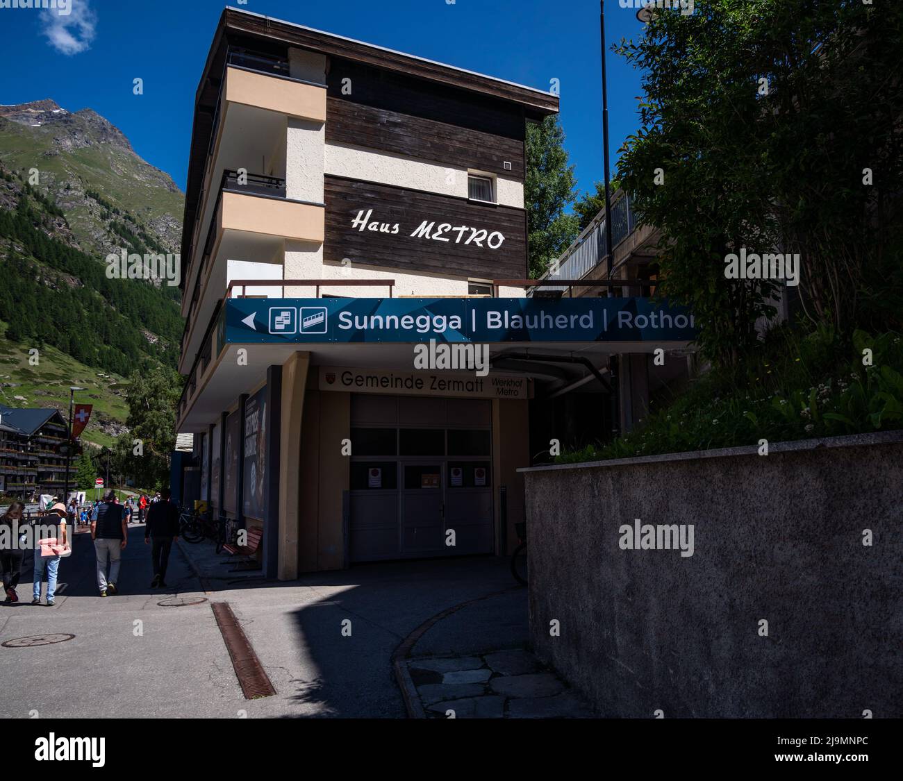 View of the main city center of Zermatt with old historic buildings ...