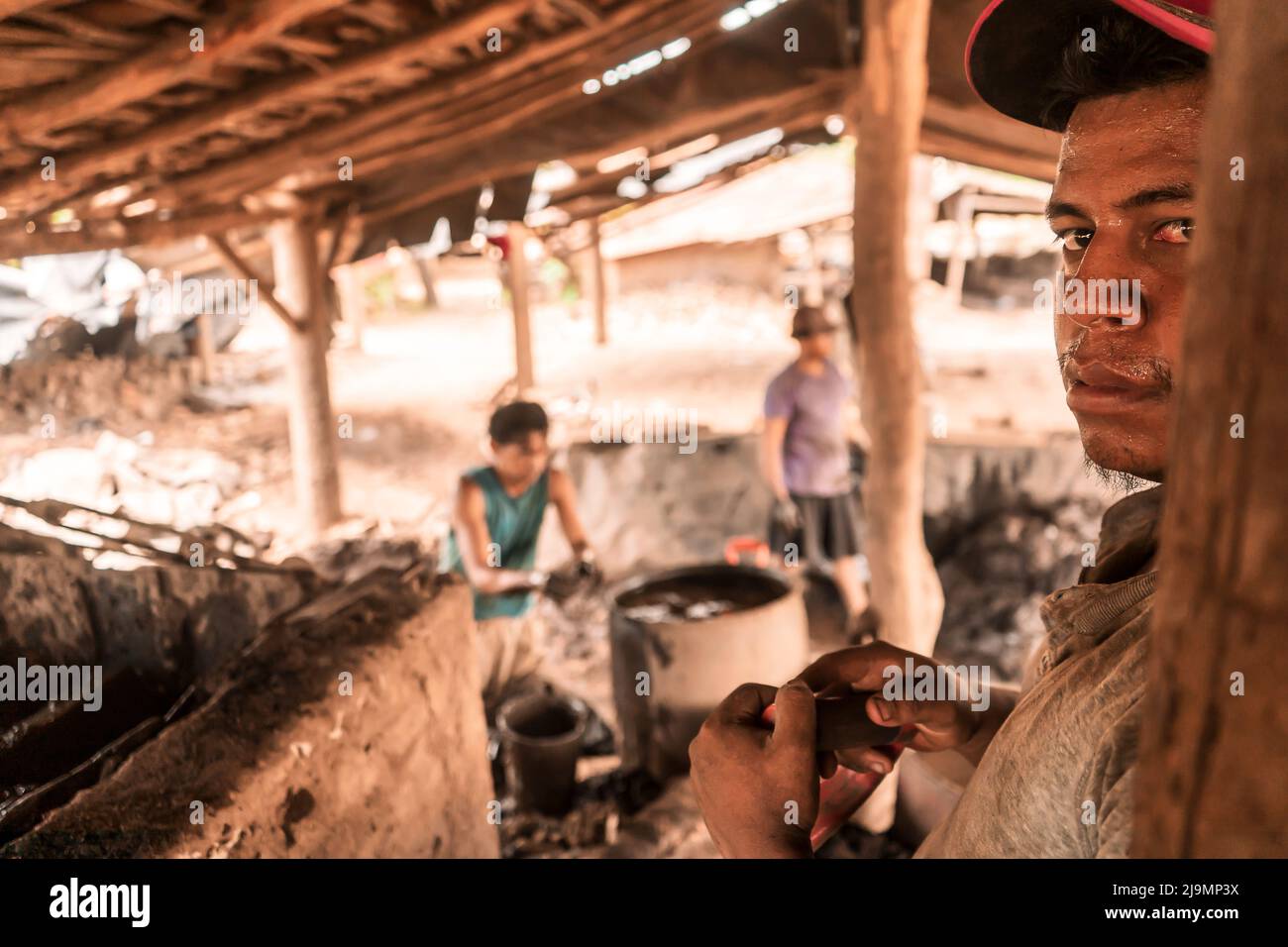 Workers in a brick and clay tile manufacturing workshop in La Paz ...
