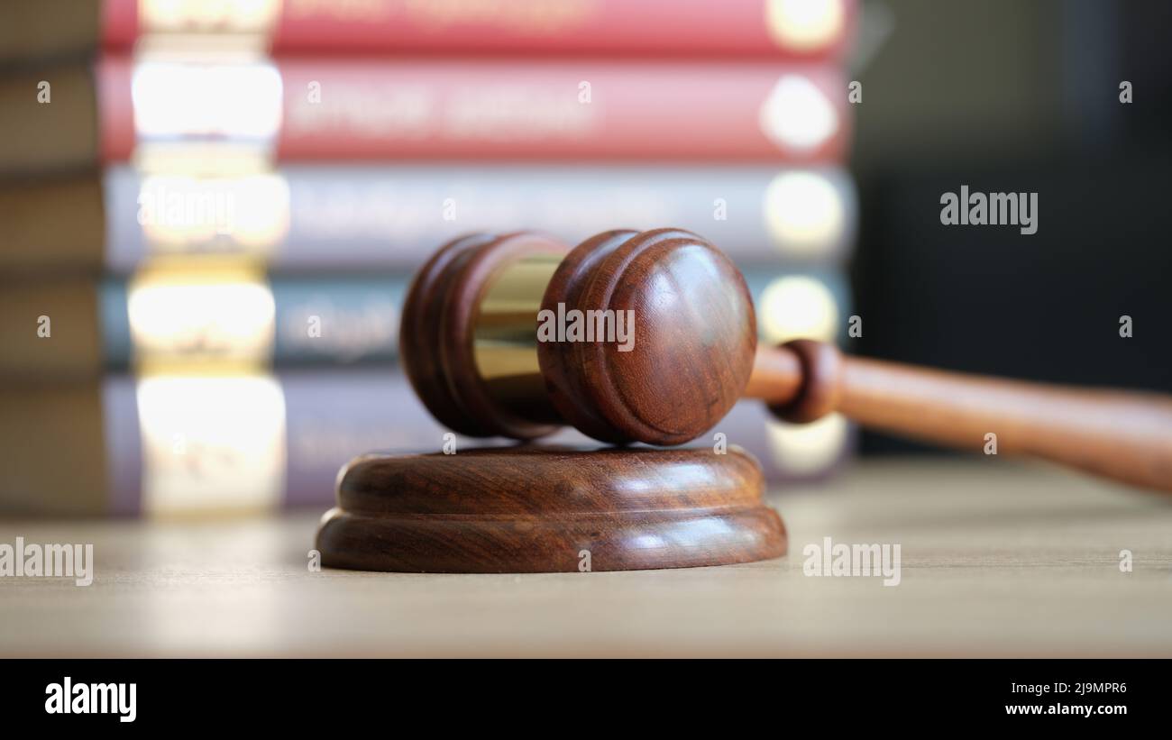 Judicial gavel and books in courtroom closeup Stock Photo - Alamy
