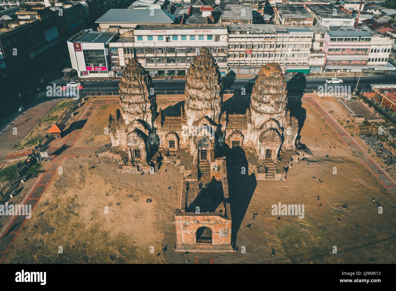 Aerial view of Pra Prang Sam Yod or Phra Prang Sam Yot ruin temple with ...
