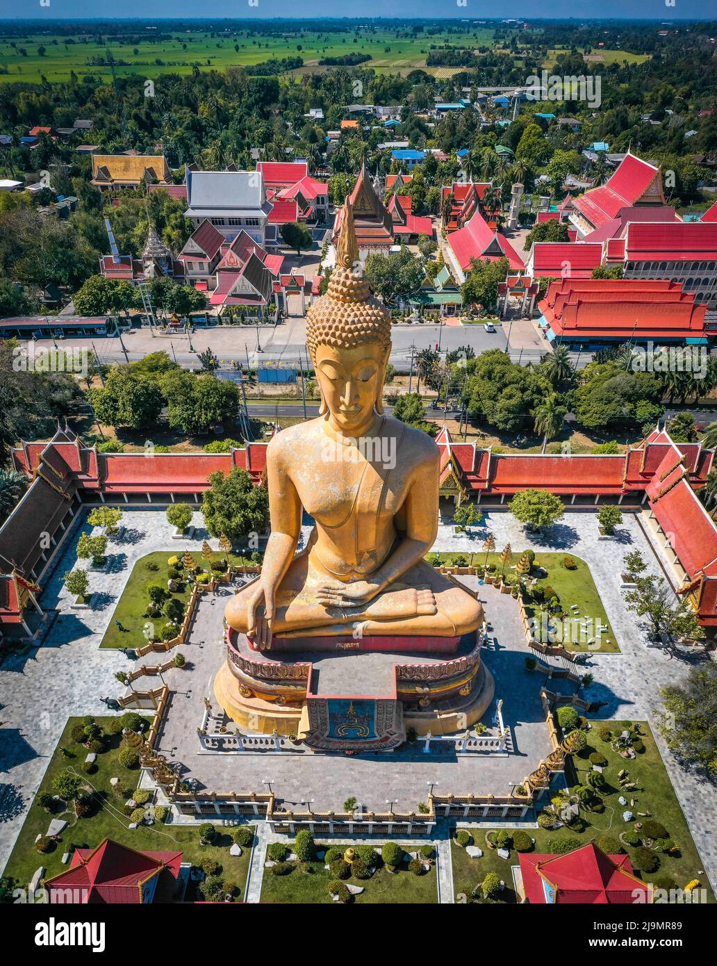 Aerial view of Wat Pikul Thong Phra Aram Luang or Wat Luang Por Pae temple with giant Buddha, in ...