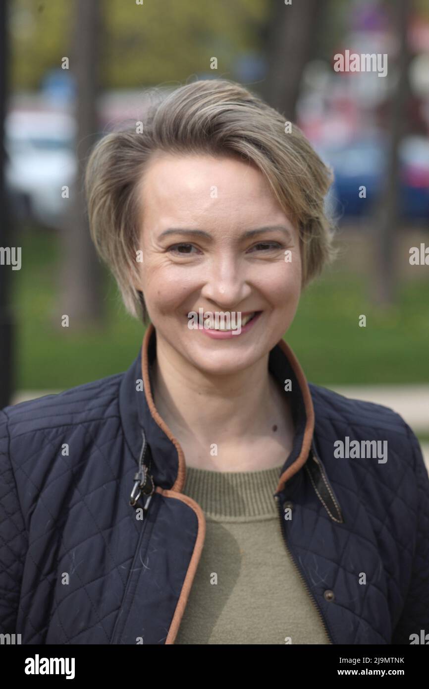 Beautiful mid age woman close-up portrait in modern casual wear ...