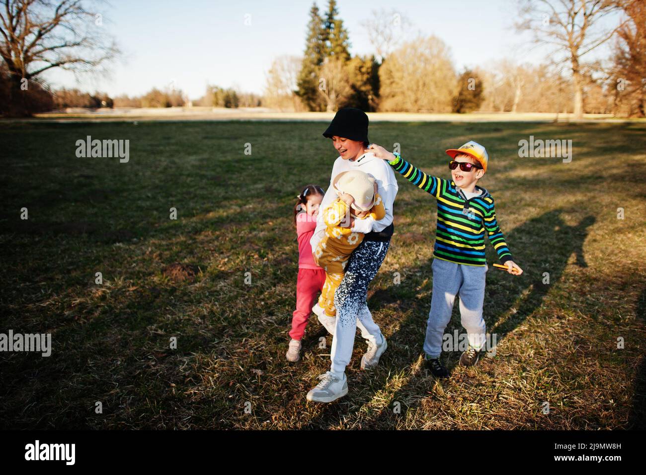 Four kids playing at Lednice park, Czech Republic Stock Photo - Alamy