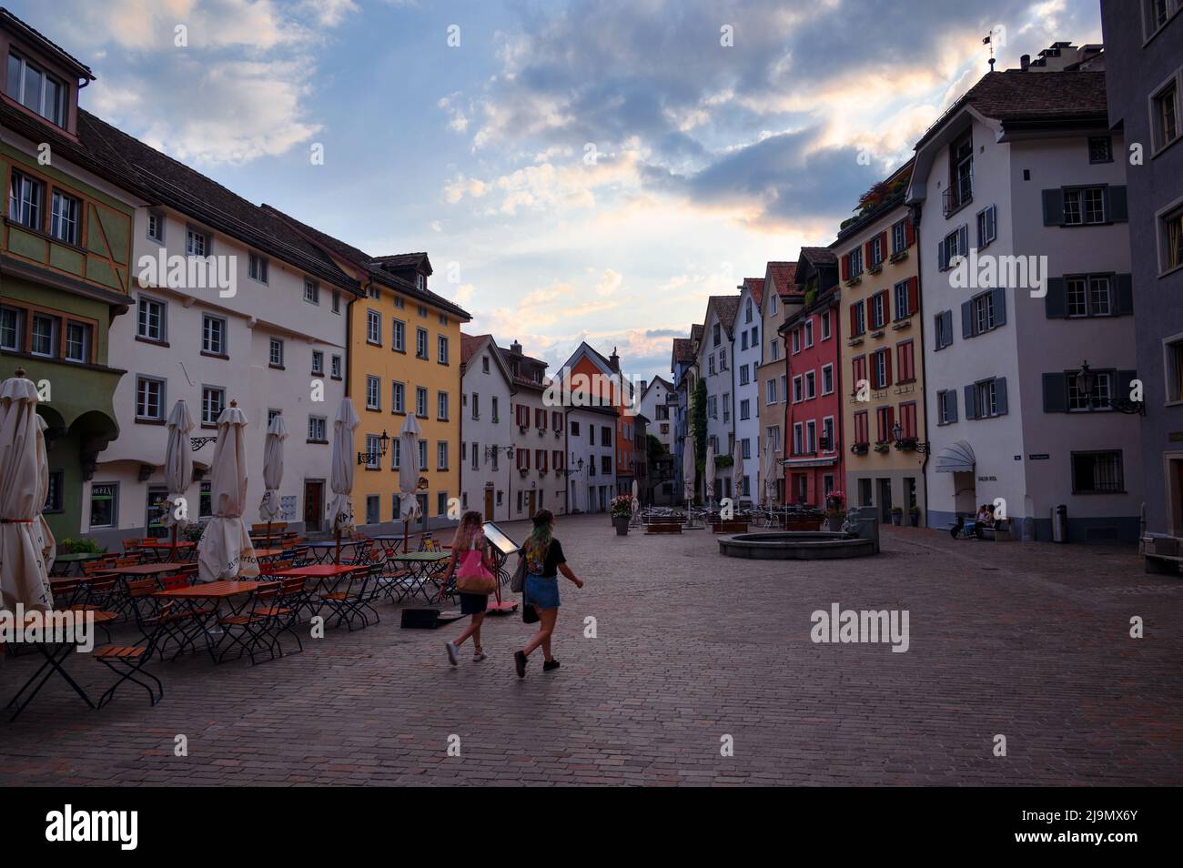 View of beautiful medieval buildings at the central square of Chur ...