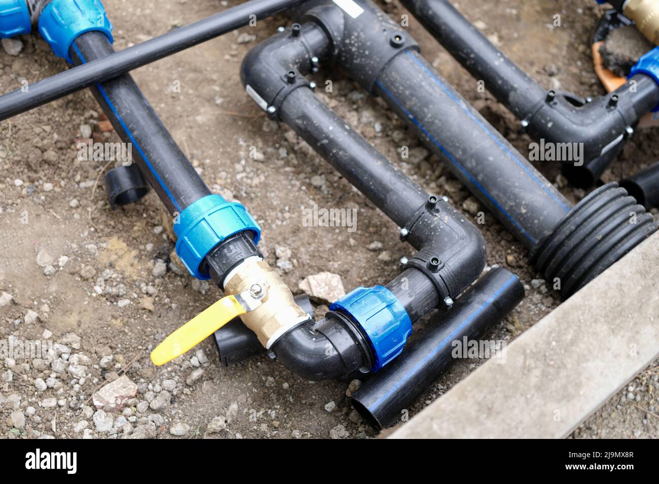 Drinking water pvc pipeline and faucets closeup Stock Photo - Alamy