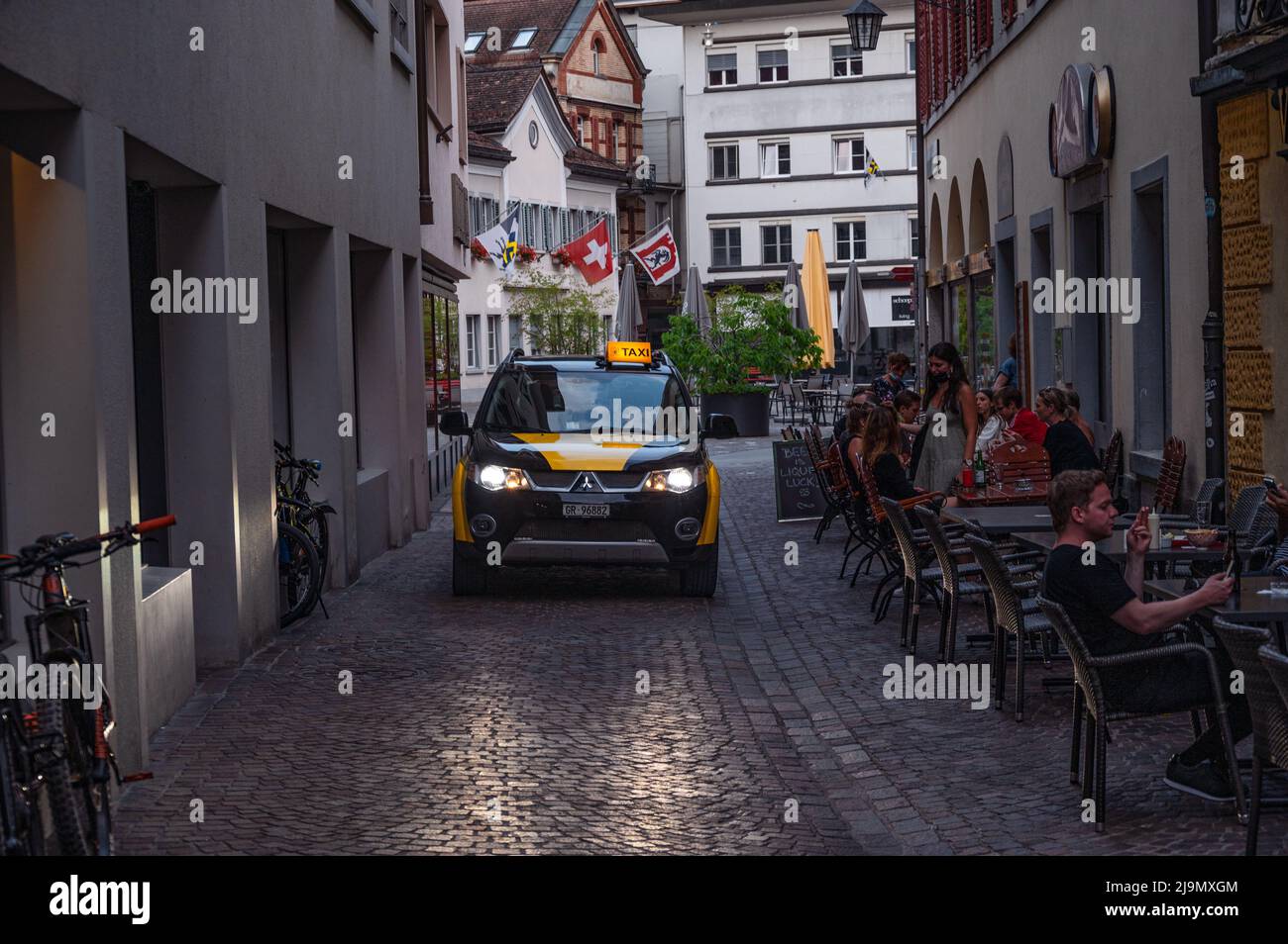 View of beautiful medieval buildings at the central square of Chur ...