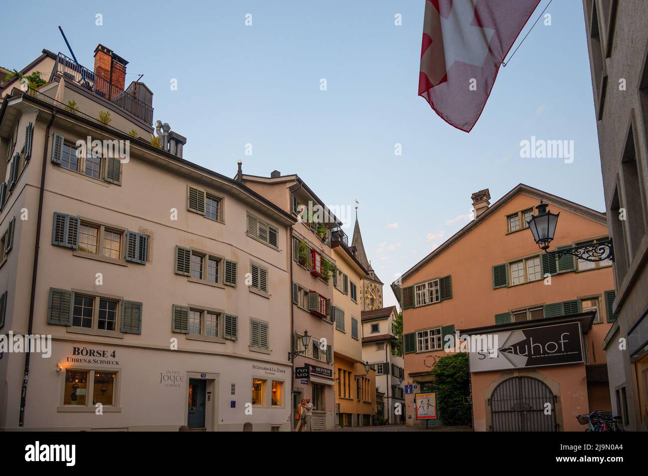 Picturesque view of Augustinergasse in Zurich with colorful medieval ...