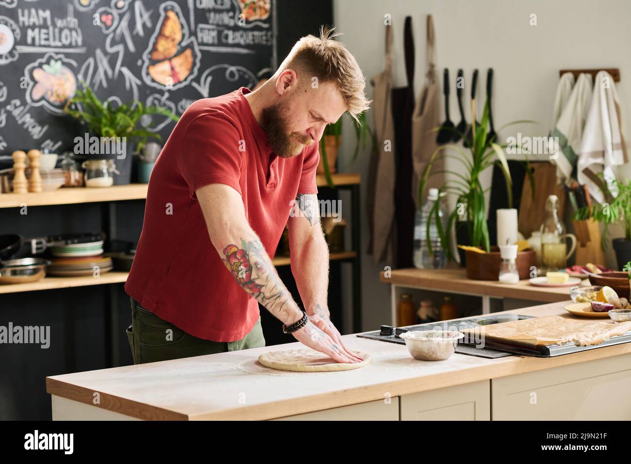 Kneading dough in modern kitchen hi-res stock photography and images ...