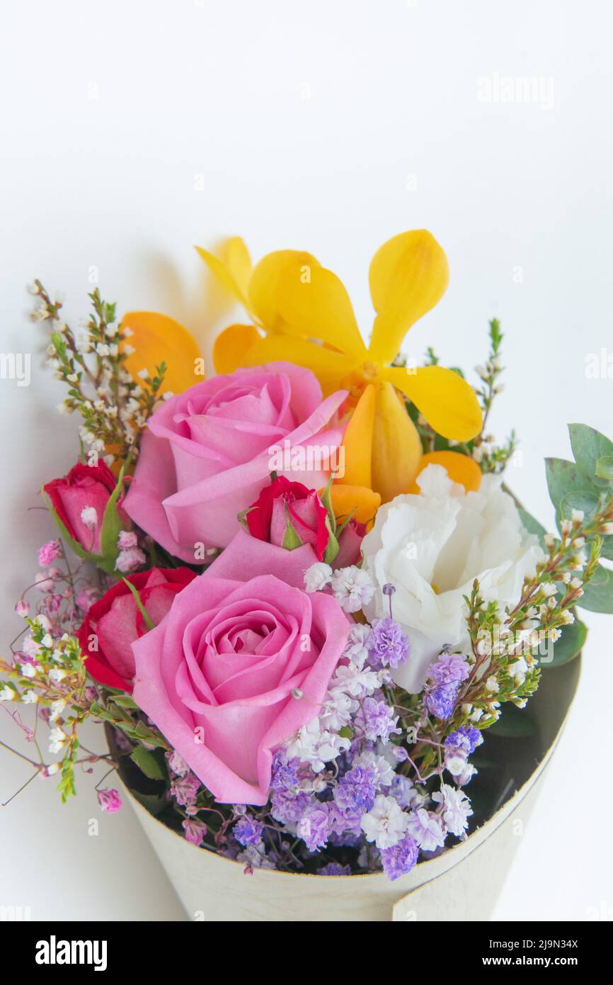 Beautiful and romantic bouquet on white background (rose, orchid ...