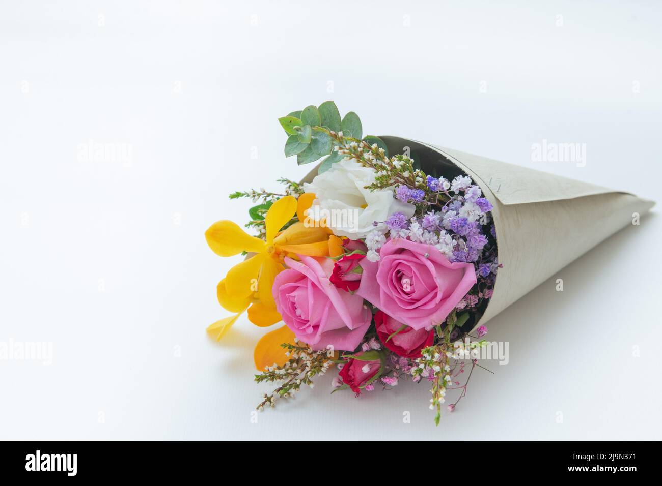Beautiful and romantic bouquet on white background (rose, orchid ...