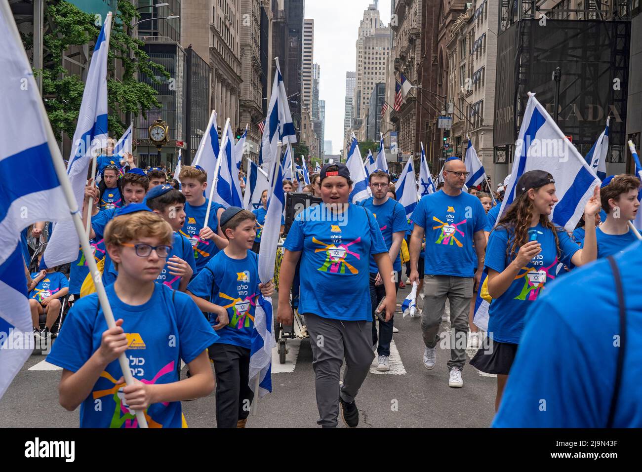 Participants holding Israeli flags march along Fifth Avenue during the ...