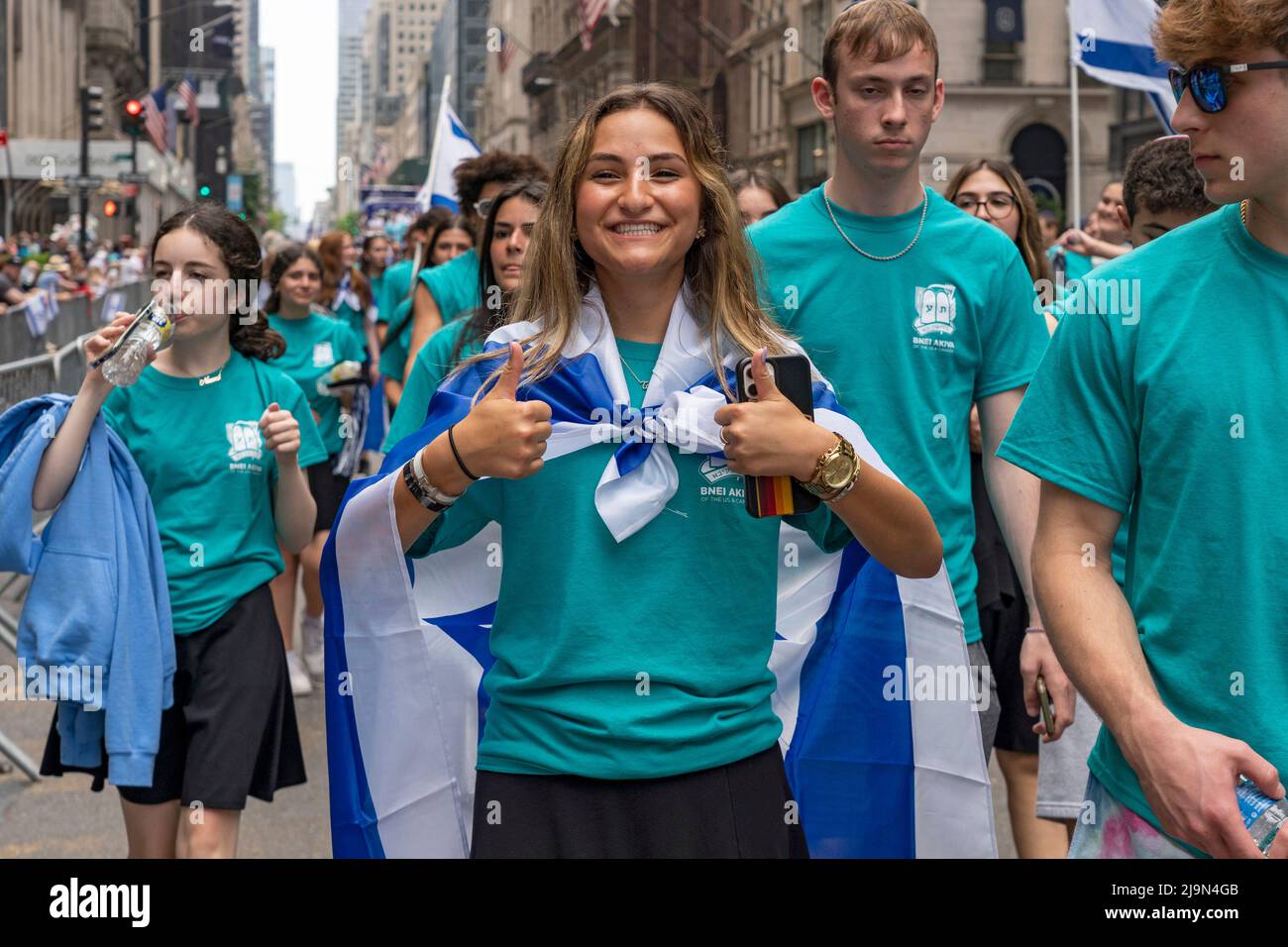 Participants holding Israeli flags march along Fifth Avenue during the ...