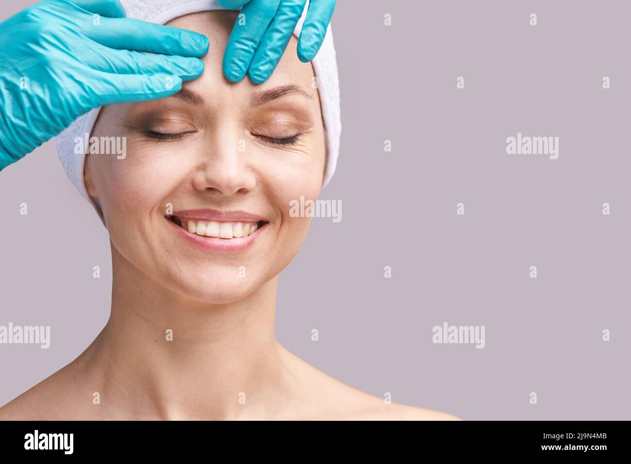 Young pretty woman studio portrait. Cosmetology concept. Esthetic woman ...