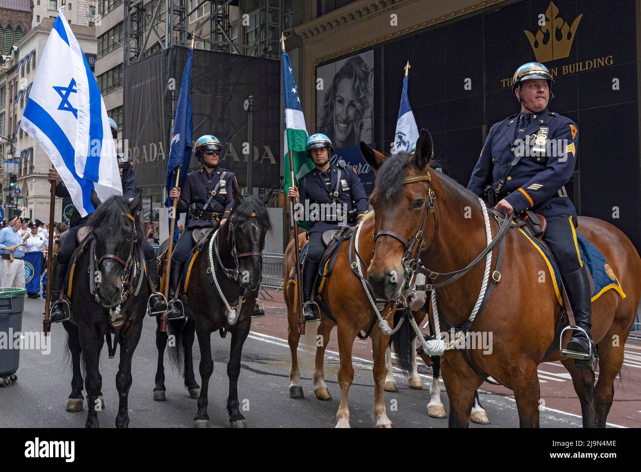 NYPD mounted unit holding flags set up on Fifth Avenue during the ...