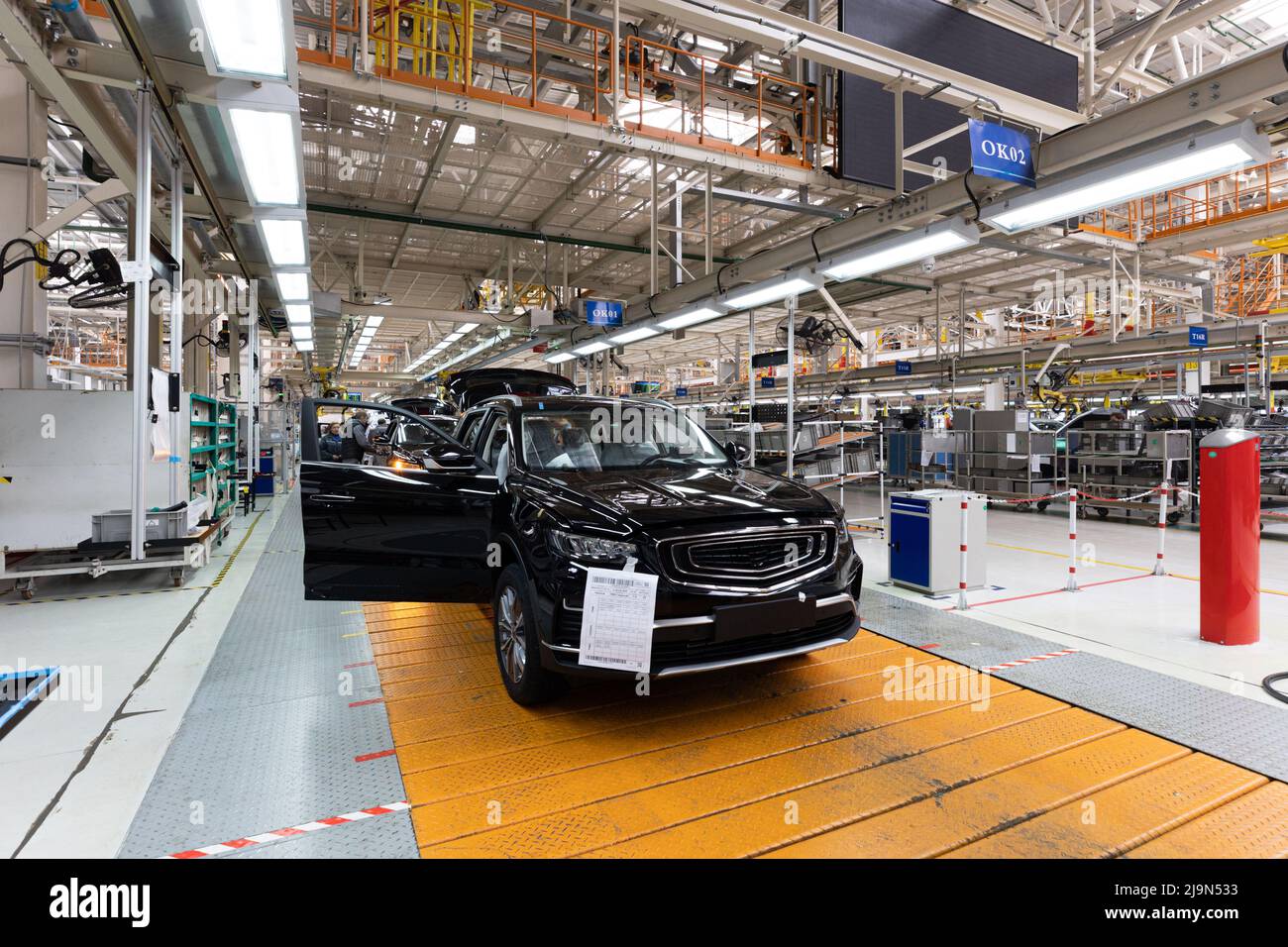 Photo of modern car assembly plant. Interior of a high-tech factory of ...