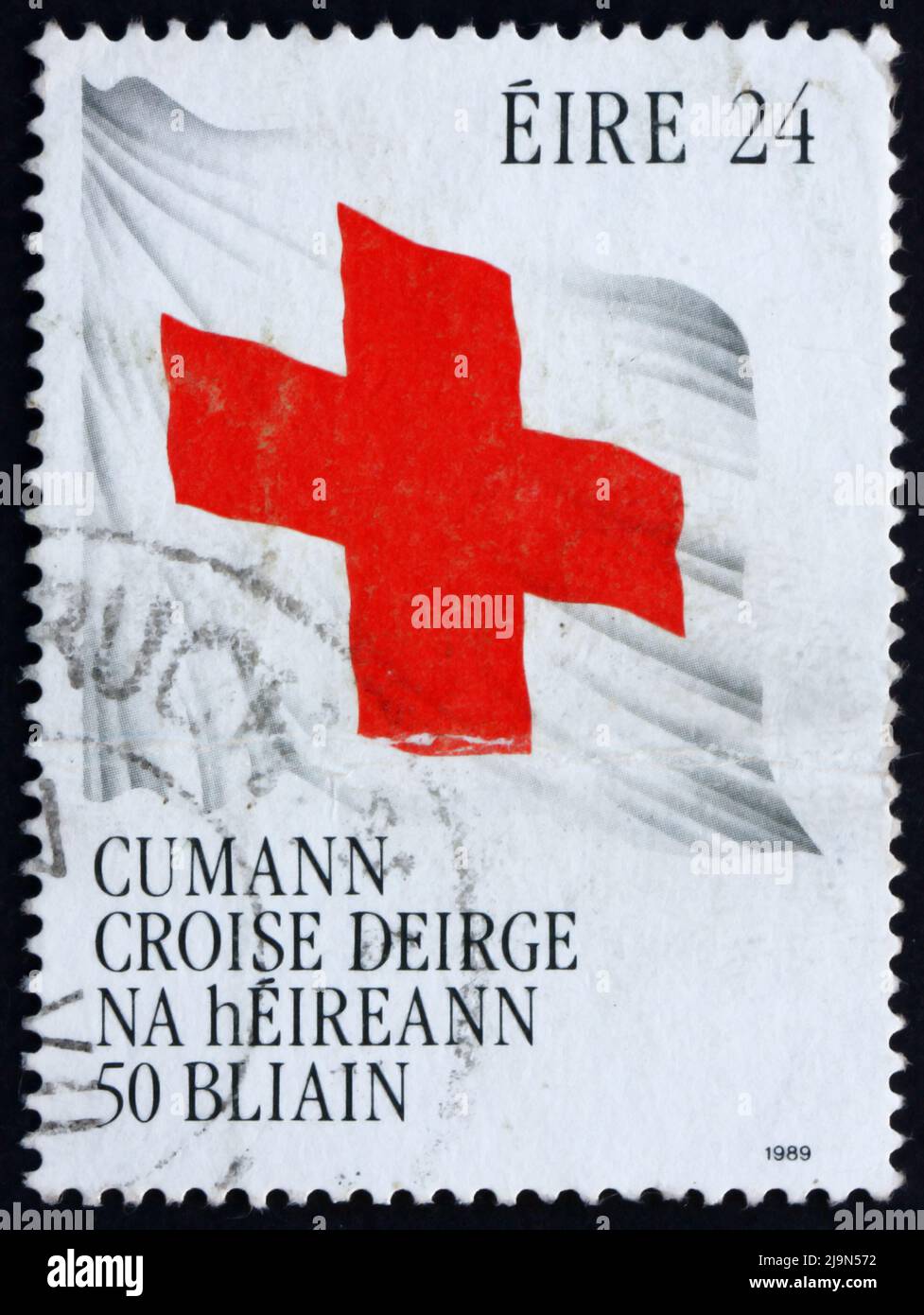IRELAND - CIRCA 1989: a stamp printed in the Ireland shows Flag with ...