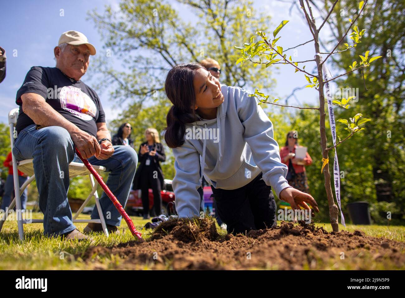 Canada children planting trees hi-res stock photography and images - Alamy