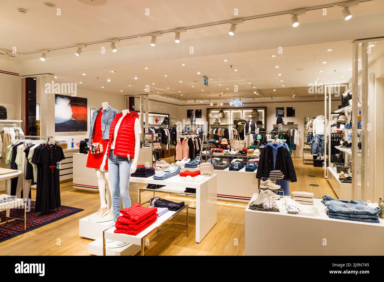 Luxury shopping mall department, clothing store interior. Panorama ...