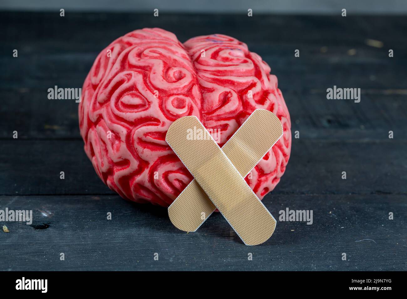 Plaster and Brain Mental Health Concept Stock Photo - Alamy