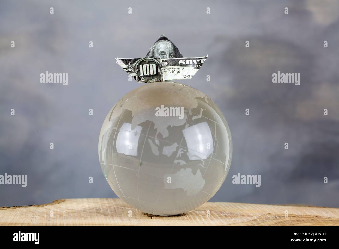 global currency and foreign exchange , Dollar boat Stock Photo - Alamy