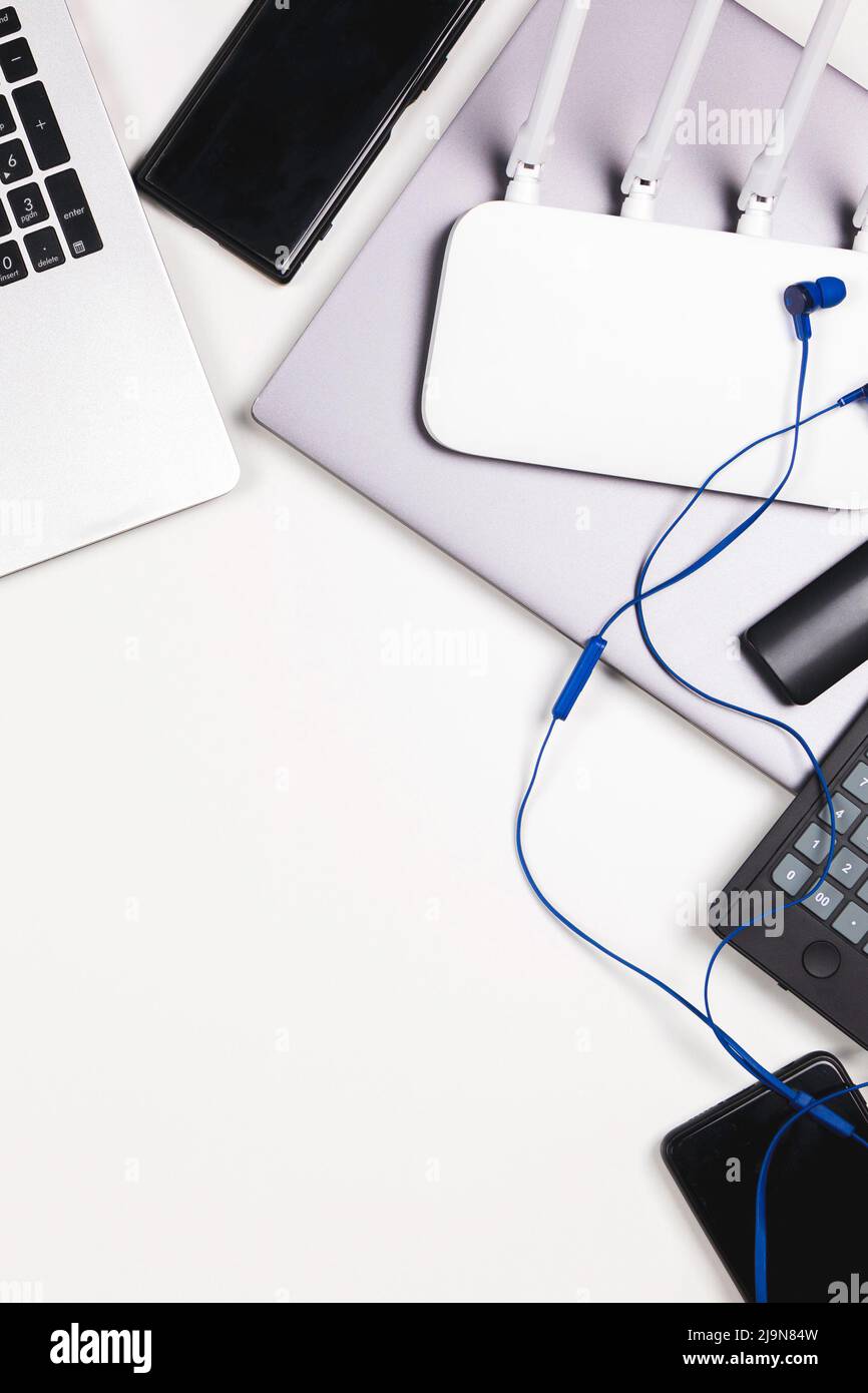 Top view to old laptop computer, mobile cell phone, many used ...