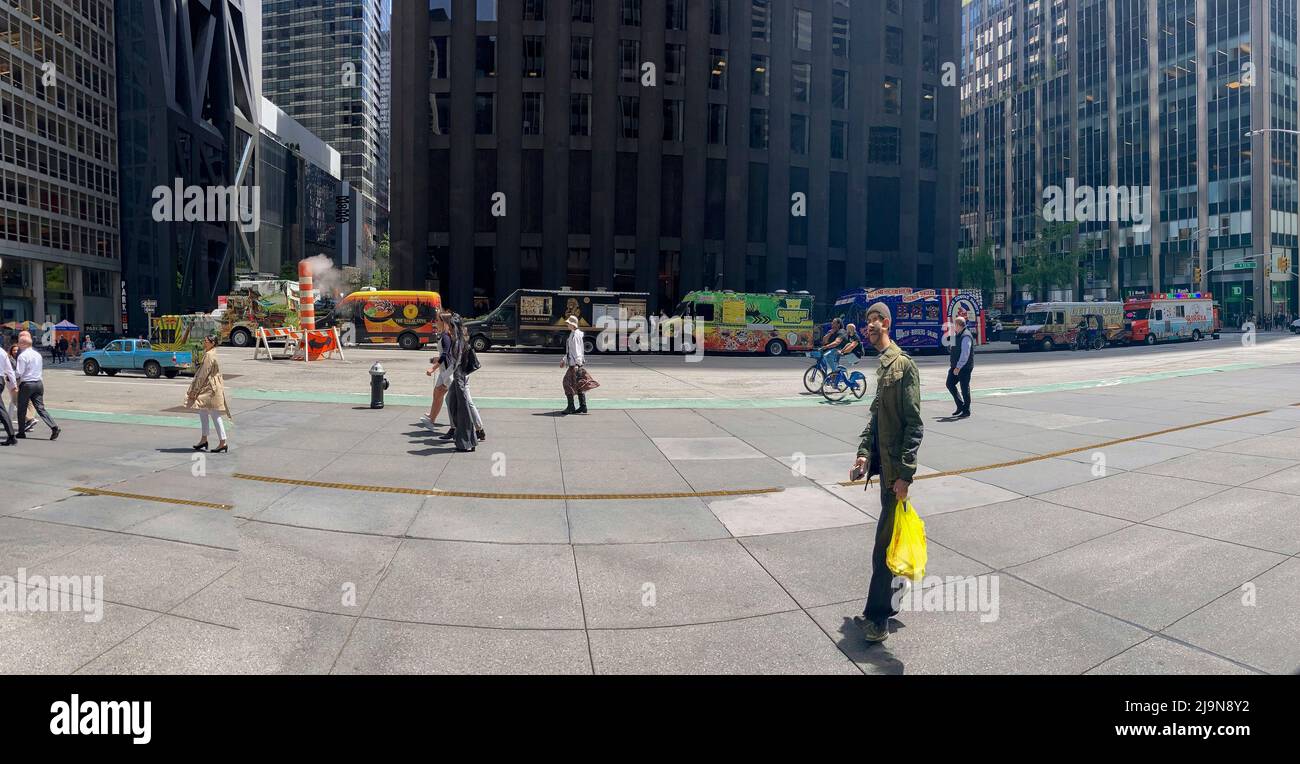 A line up of food trucks in Midtown Manhattan on Wednesday, May 5, 2022 ...