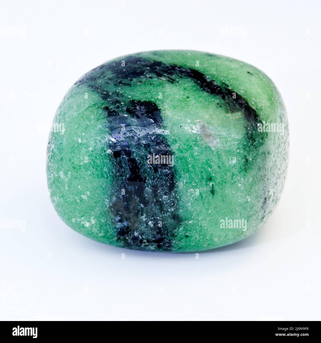 Macro close up colour photograph of a polished " Ruby in Zoisite " a ...