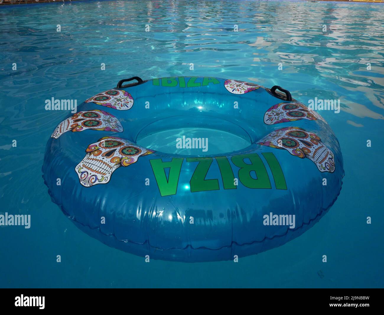 A rubber ring in a swimming pool Stock Photo - Alamy