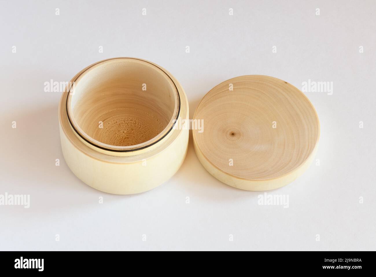 Round wooden casket mock up on white background Stock Photo - Alamy