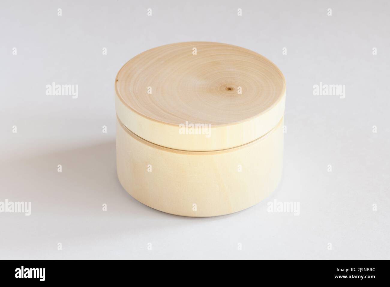 Round wooden casket mock up on white background Stock Photo - Alamy