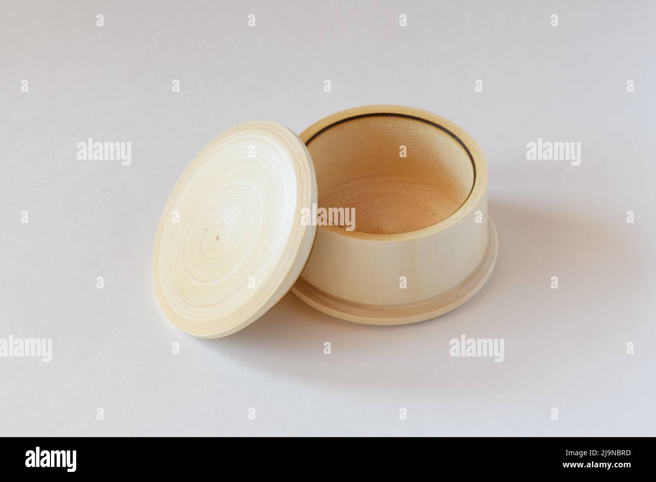 Round wooden casket mock up on white background Stock Photo - Alamy