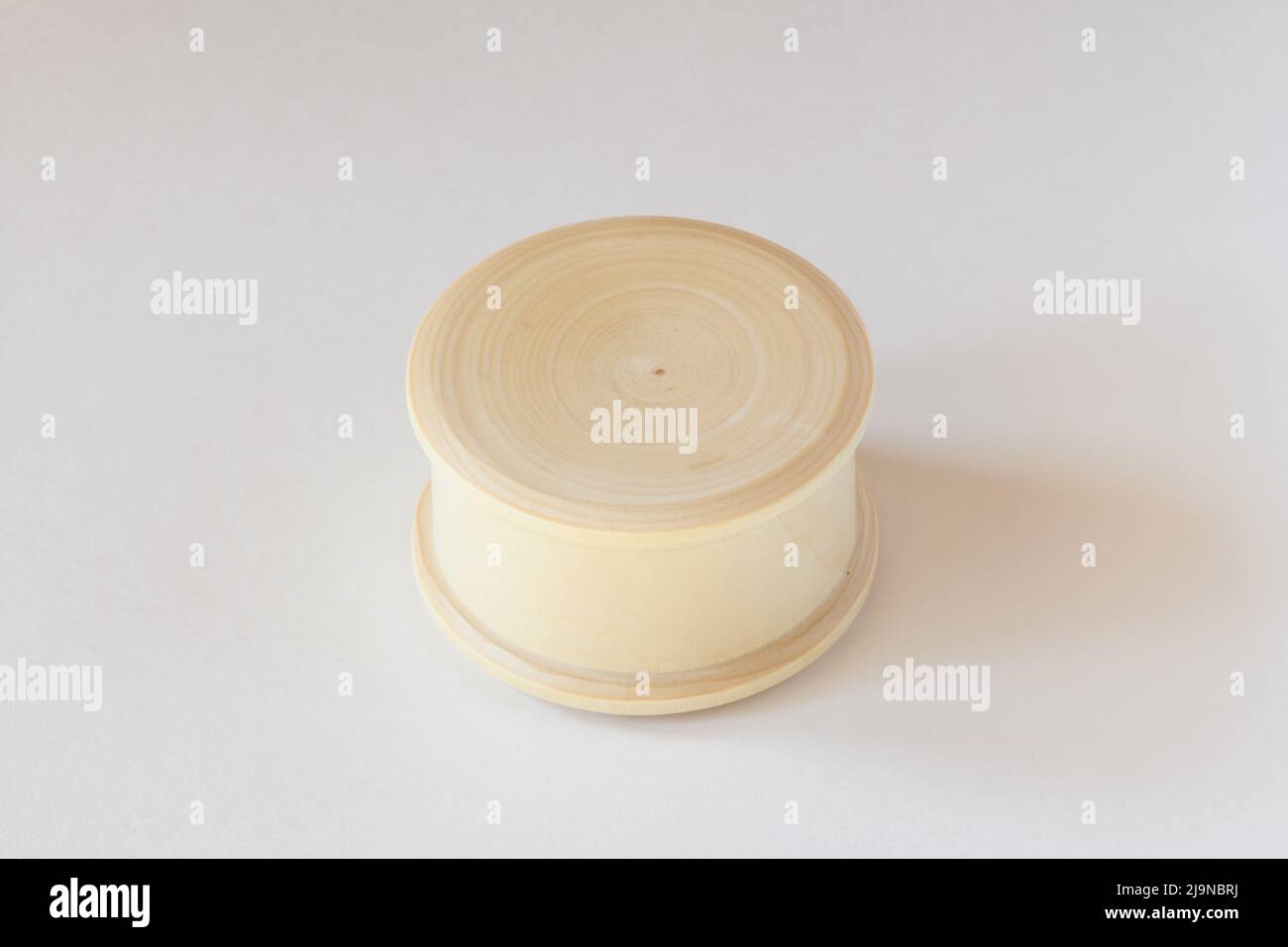 Round wooden casket mock up on white background Stock Photo - Alamy