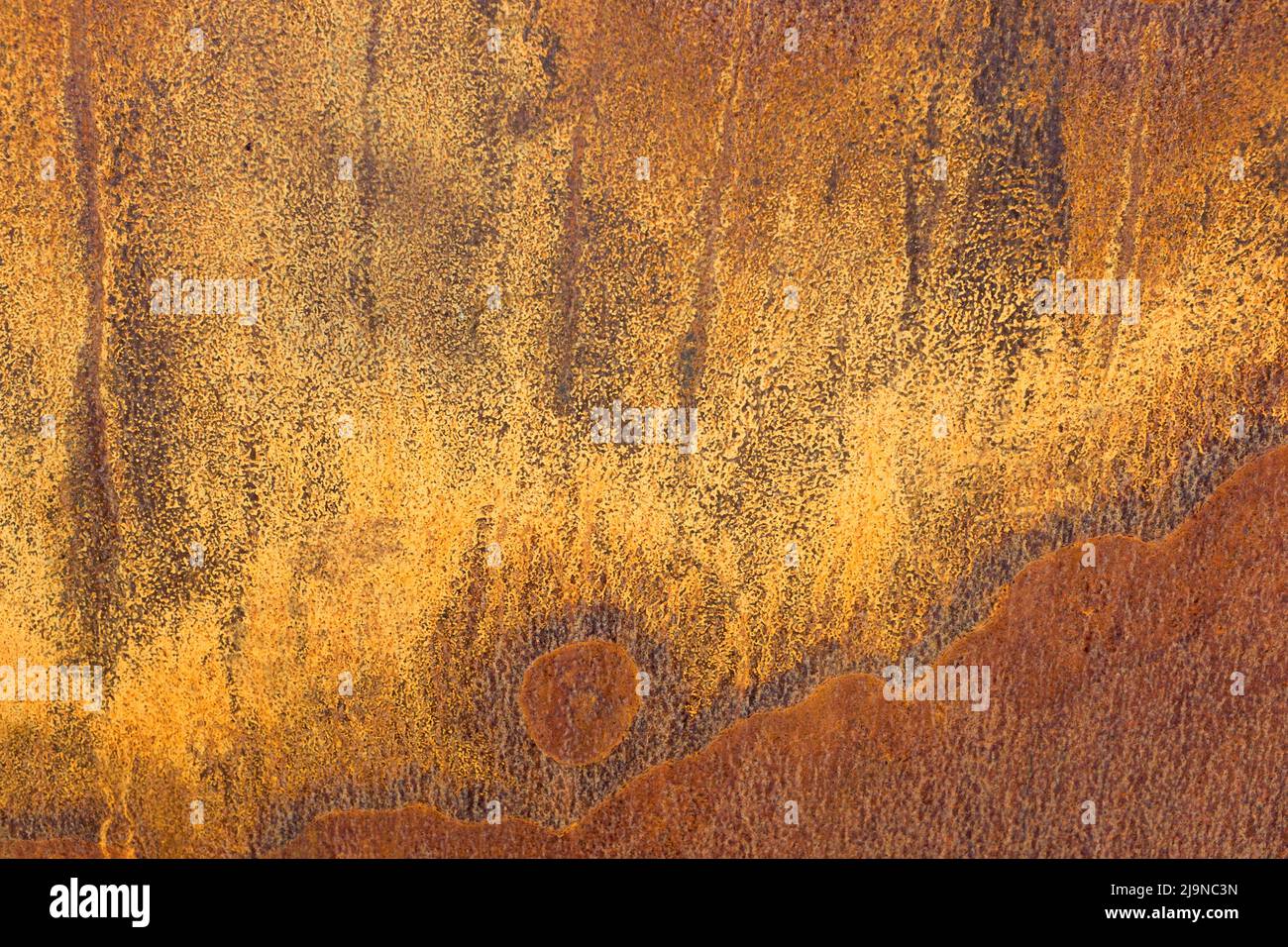 Russet colours of a rusty patterned texture on a metallic surface Stock ...