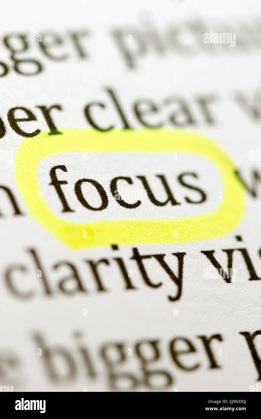 Close up of the typed word focus circled in yellow fluorescent ...