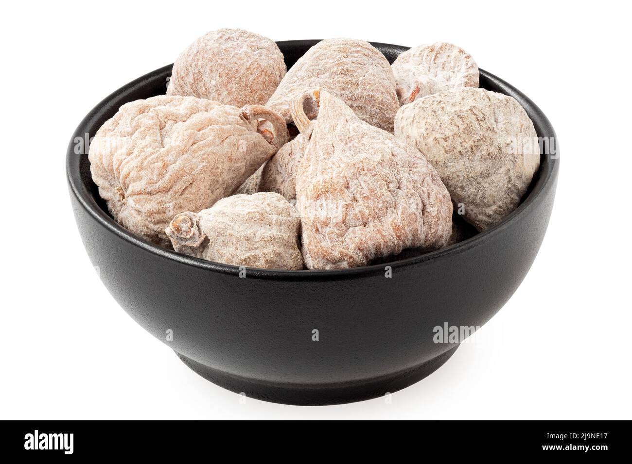 Dusted dried baby figs in a black ceramic bowl isolated on white Stock ...