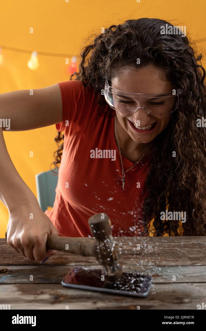 Woman breaking glass hand hi-res stock photography and images - Alamy