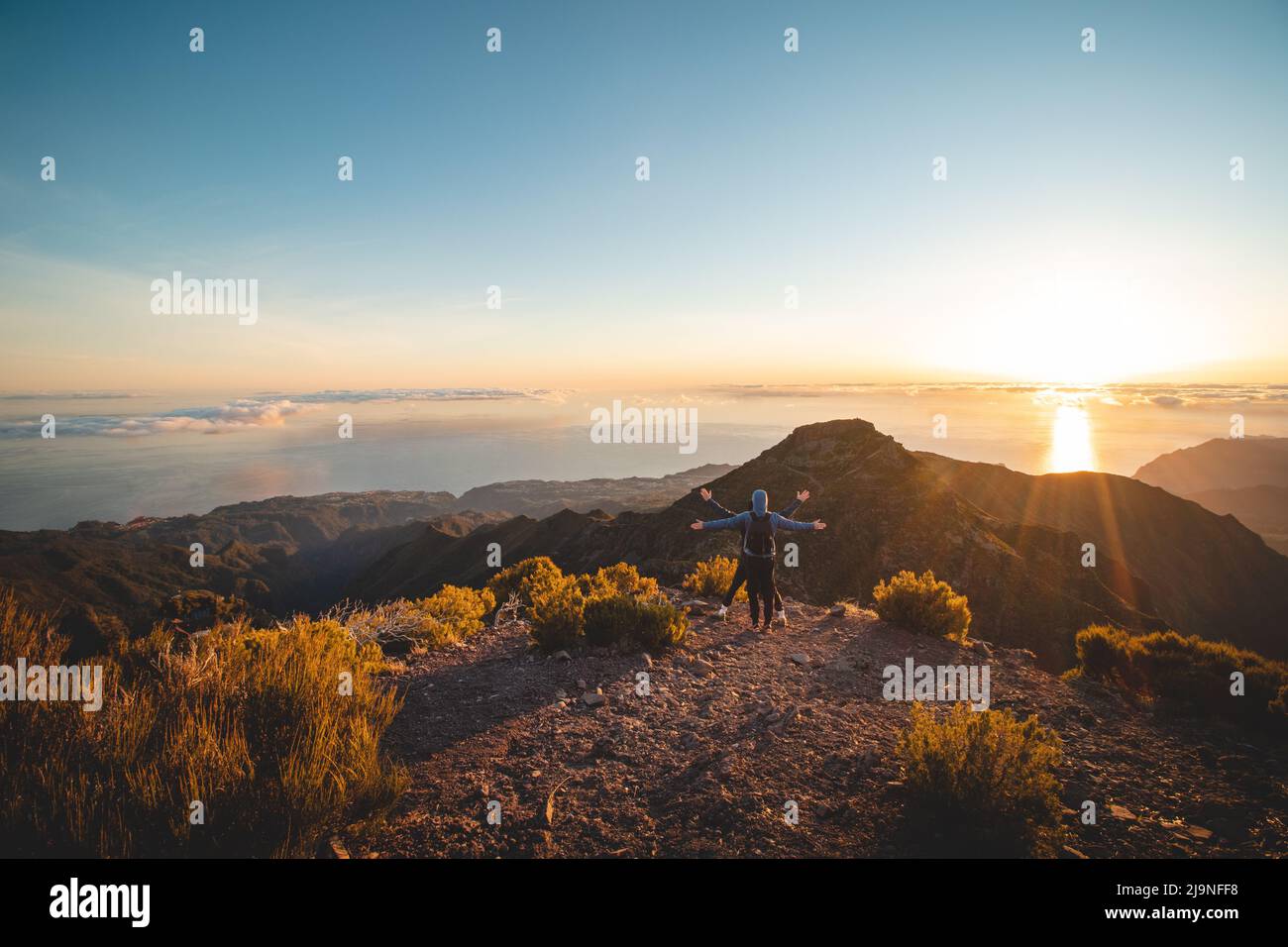 Candid portrait of two brothers who climbed the highest mountain Pico ...