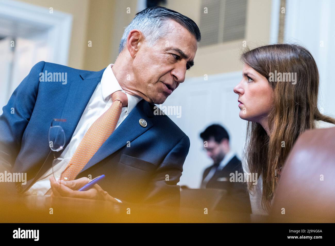 UNITED STATES - MAY 17: Rep. Darrell Issa, R-Calif., talks with an aide ...