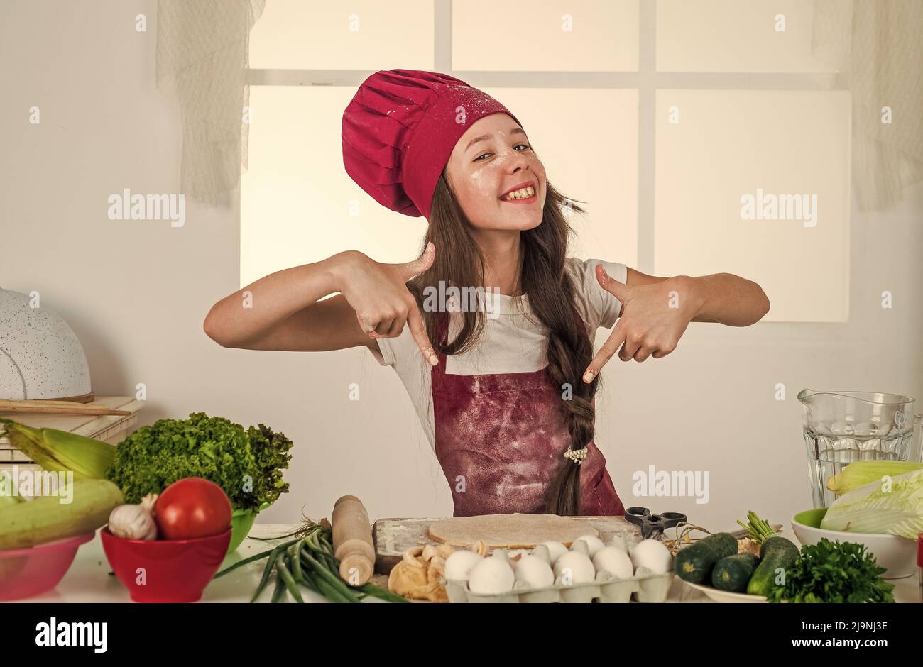 kid having fun while cooking, happiness Stock Photo - Alamy