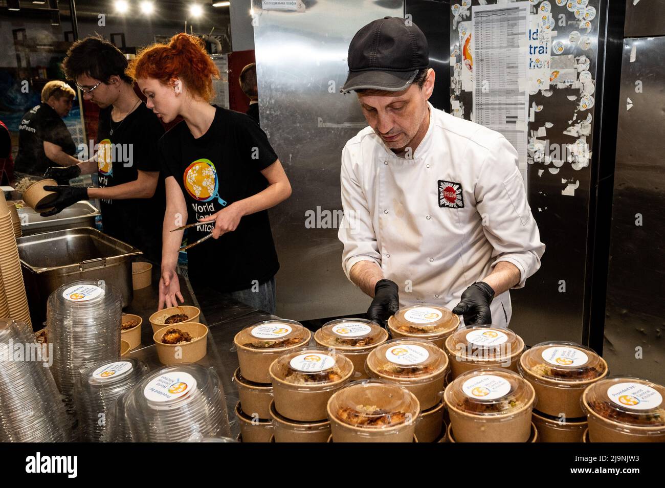 Food being prepared at a World Central Kitchen location where meals are ...