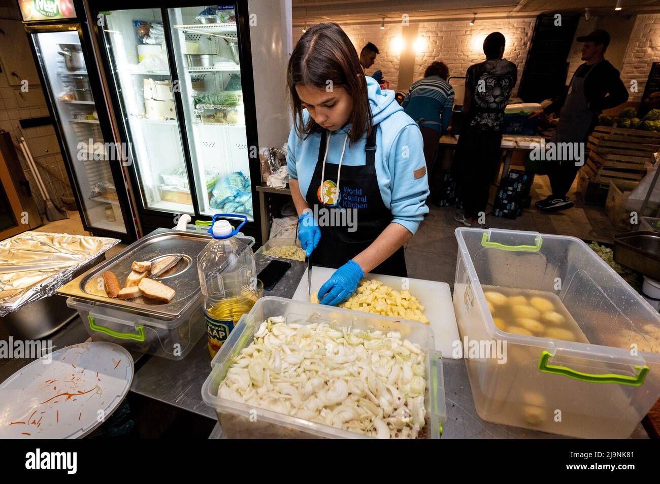 Food being prepared at a World Central Kitchen location where meals are ...