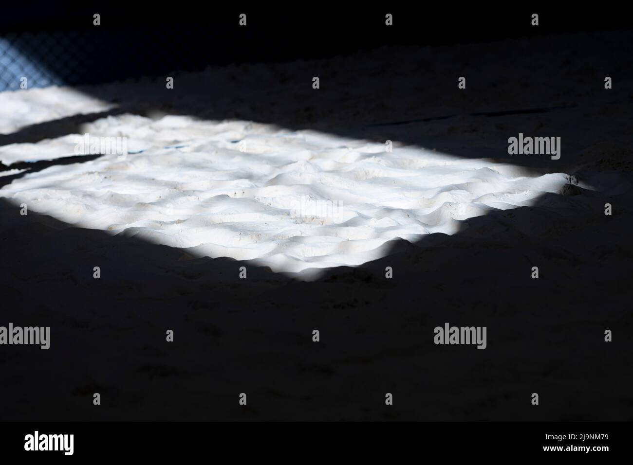 The shadow from the window on sand volleyball court Stock Photo - Alamy